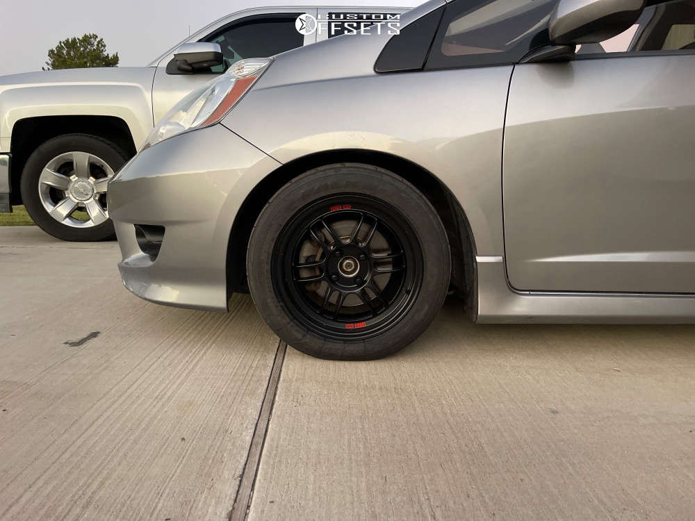 2009 Honda Fit with 15x7 35 Enkei RPF1 and 205/50R15 Falken Azenis ...