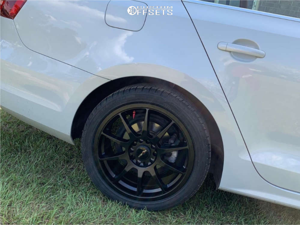 2017 Volkswagen Jetta with 17x7 38 Vision Bane and 205/45R17 Arroyo ...