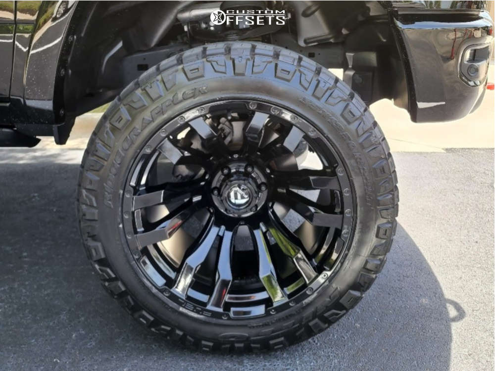 2021 Ram 1500 with 22x12 -44 Fuel Blitz and 35/12.5R22 Nitto Ridge ...
