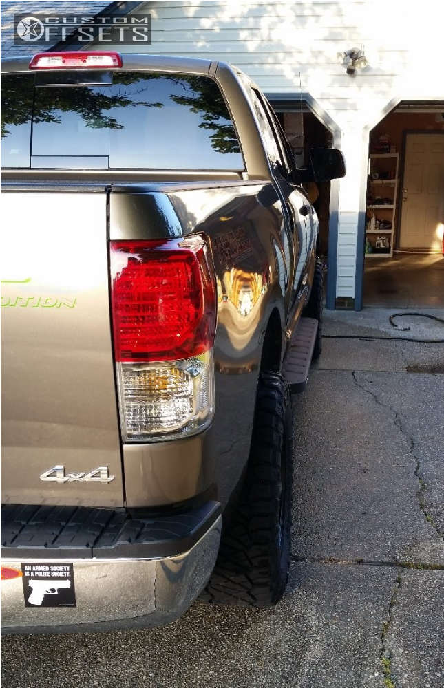 2010 Toyota Tundra with 18x9 12 Level 8 Tracker and 33/12.5R18 Nitto ...