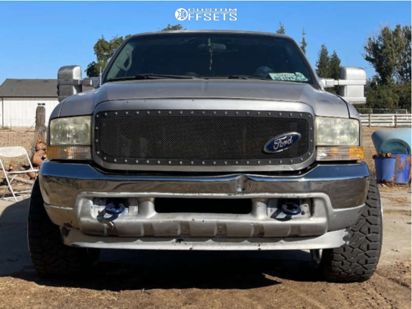 2002 Ford Excursion with 24x14 -76 TIS 551P and 33/12.5R24 Venom Power ...