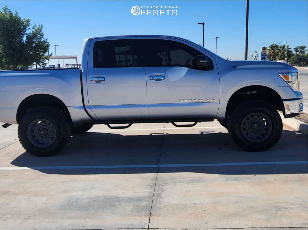 2018 Nissan Titan with 18x9.5 -18 Vision Tactical and 295/70R18 Falken ...