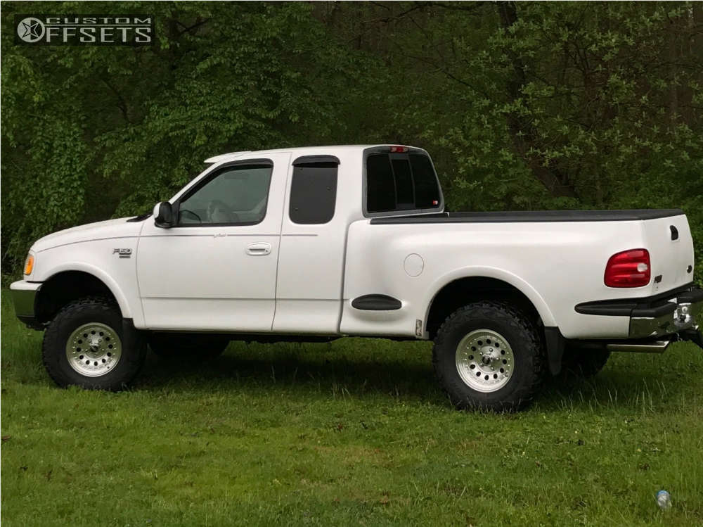 1998 Ford F-150 with 16x7 -8 American Racing Outlaw Ii and 305/70R16 ...