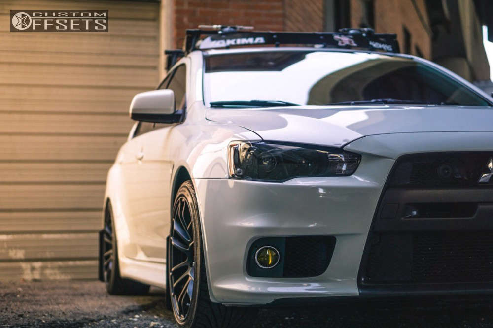 2011 Mitsubishi Lancer with 18x9.5 22 AVID1 AV20 and 265/35R18 Triangle ...