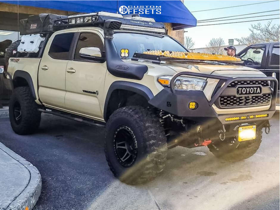 2017 Toyota Tacoma with 17x9 -44 Method Mr106 and 315/70R17 Cooper ...