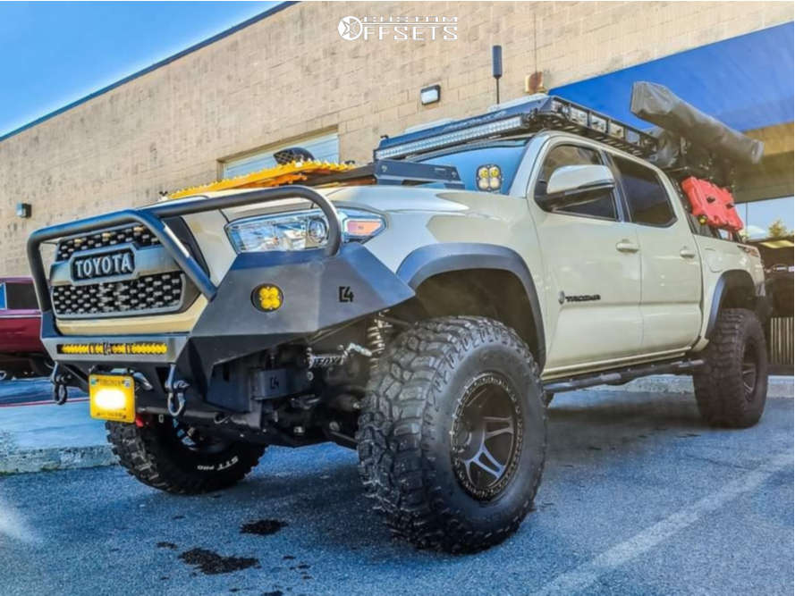 2017 Toyota Tacoma with 17x9 -44 Method Mr106 and 315/70R17 Cooper ...