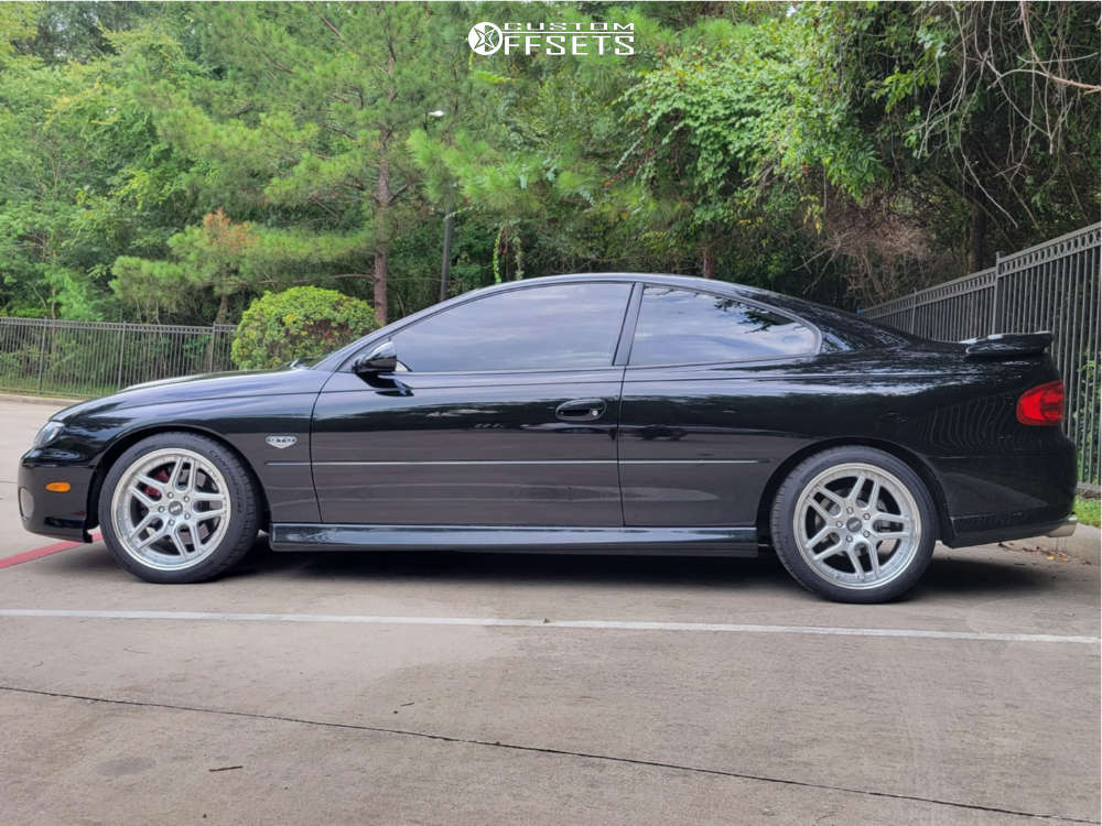 2005 Pontiac GTO with 18x8.5 30 ESR CS15 and 235/40R18 Continental ...