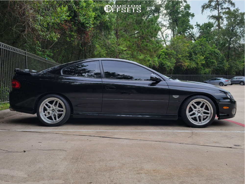 2005 Pontiac GTO with 18x8.5 30 ESR CS15 and 235/40R18 Continental ...