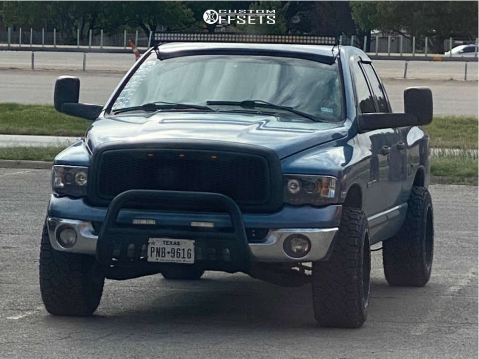 2004 Dodge Ram 1500 with 20x12 -51 Vision Rocker and 33/12.5R20 Kenda ...