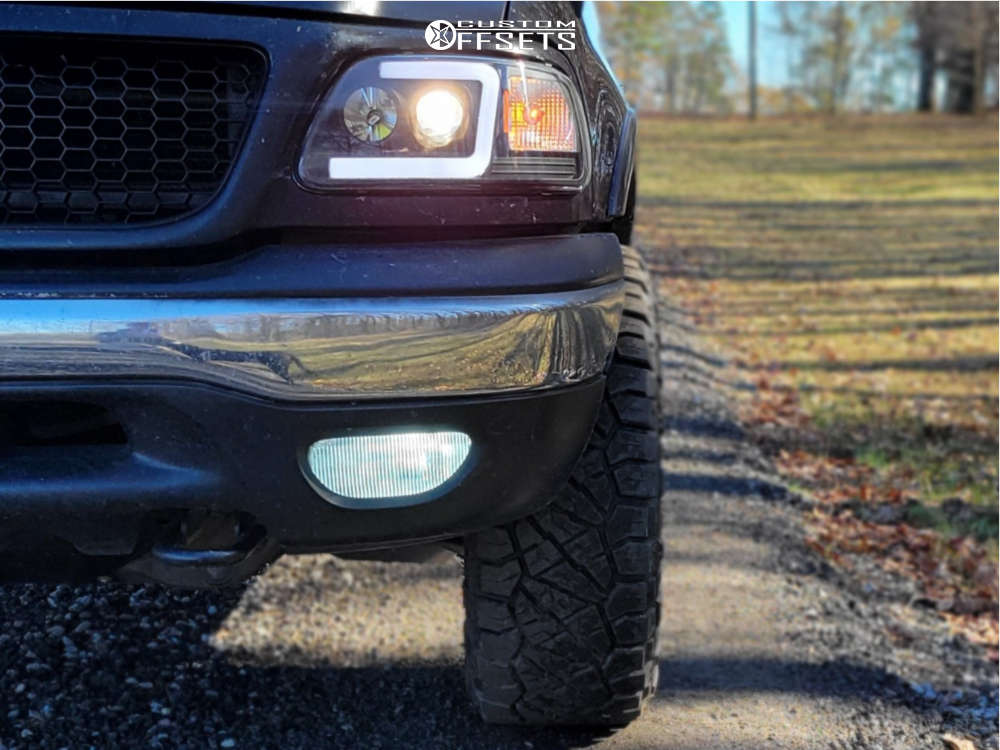 2003 Ford F-150 with 17x9 -12 Ultra Type 164 and 33/12.5R17 Nitto Ridge ...