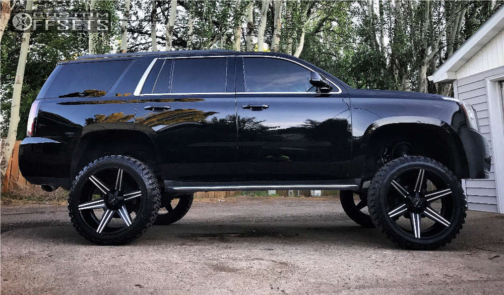2015 GMC Yukon with 24x11 -25 Tuff T12 and 35/12.5R24 Haida Mud Champ ...