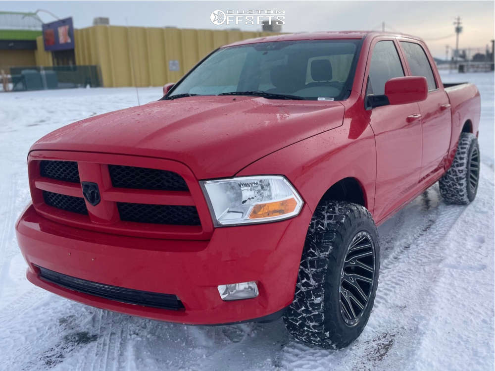 2012 Ram 1500 with 20x12 -44 TIS 554BM and 35/12.5R20 Landspider ...