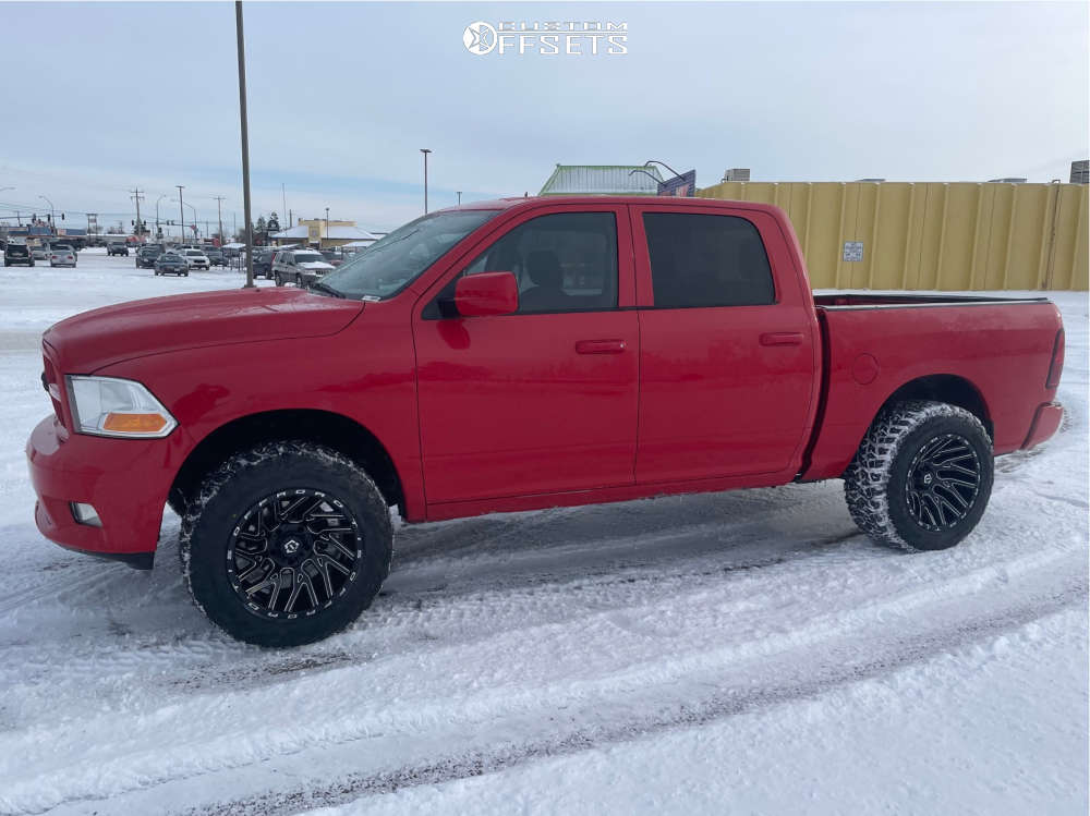 2012 Ram 1500 with 20x12 -44 TIS 554BM and 35/12.5R20 Landspider ...