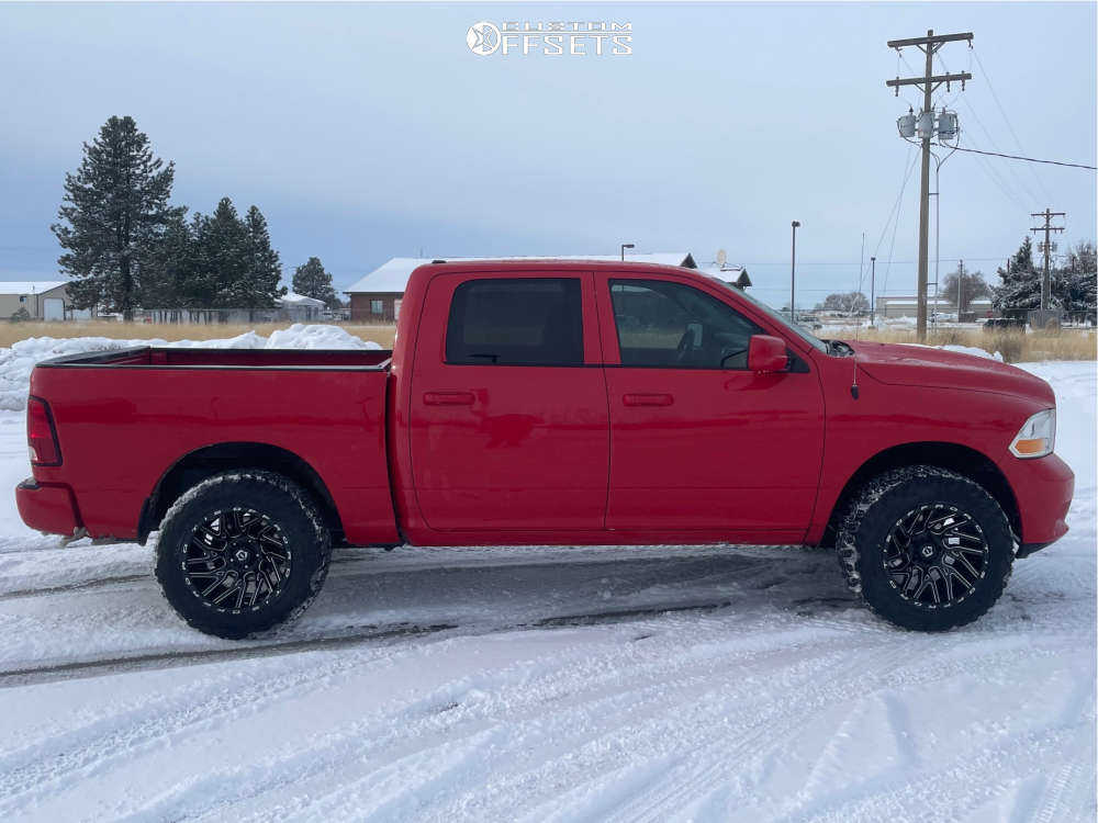 2012 Ram 1500 with 20x12 -44 TIS 554BM and 35/12.5R20 Landspider ...