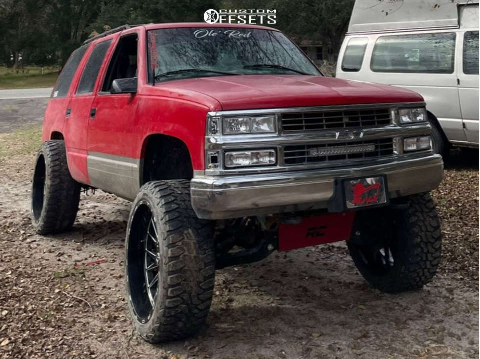 1999 Chevrolet Tahoe with 24x12 -44 TIS 547BM and 35/12.5R24 Haida Mud ...