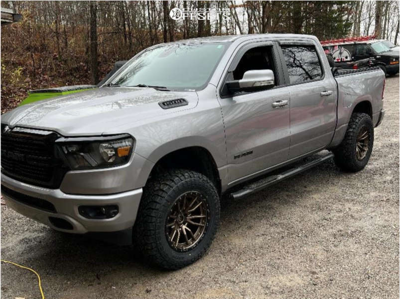 2020 Ram 1500 with 20x10 -18 Fuel Rebel 6 and 35/12.5R20 Kenda Klever R ...