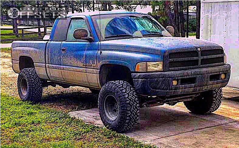 1999 Dodge Ram 1500 with 15x10 -47 Pro Comp Series 69 and 33/12.5R15 ...