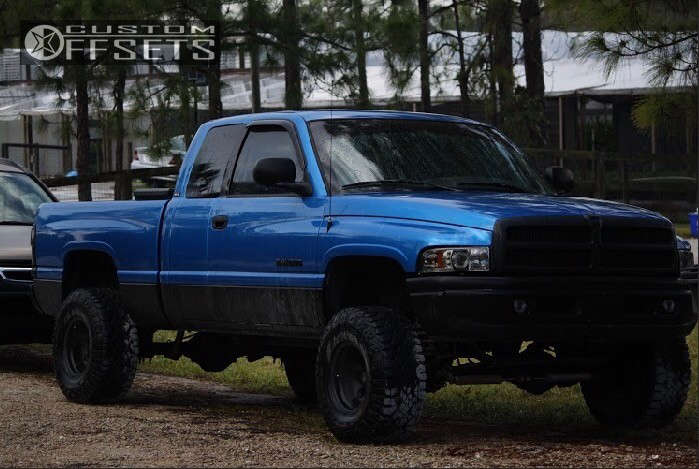 1999 Dodge Ram 1500 with 15x10 -47 Pro Comp Series 69 and 33/12.5R15 ...