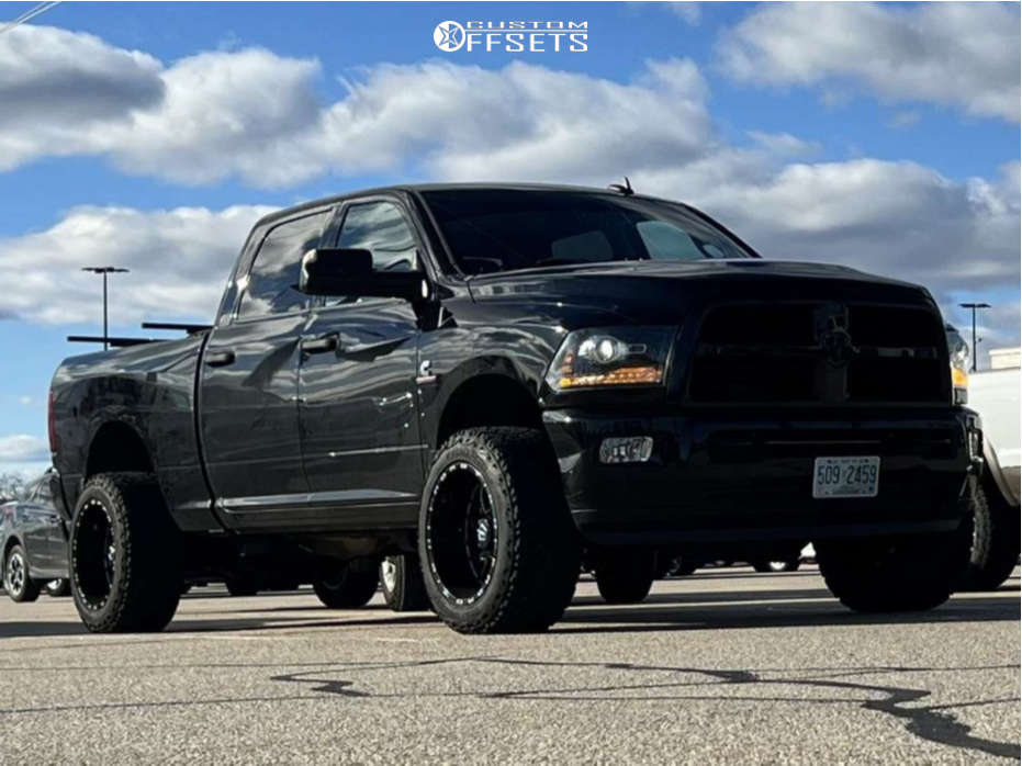 2014 Ram 2500 with 20x12 -44 TIS 544bm and 33/12.5R20 Venom Power Terra ...