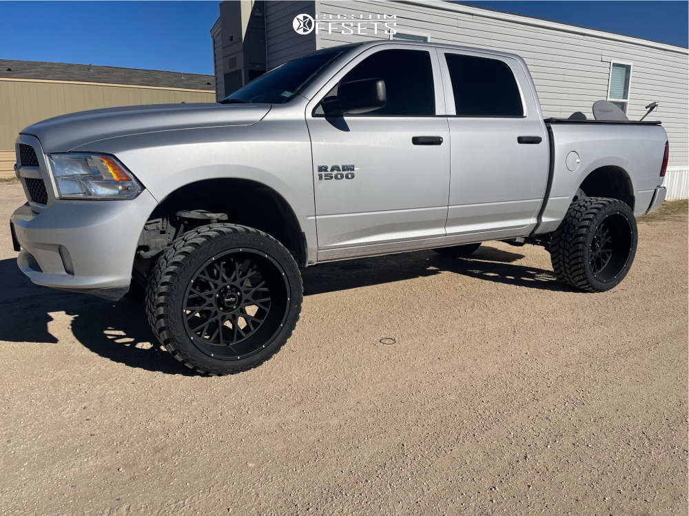2018 Ram 1500 with 24x12 -51 Vision Rocker and 35/13.5R24 AMP Mud ...
