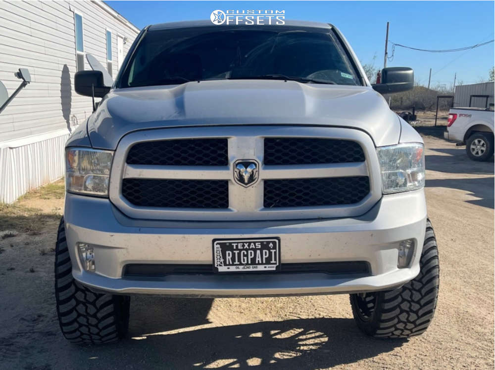 2018 Ram 1500 with 24x12 -51 Vision Rocker and 35/13.5R24 AMP Mud ...