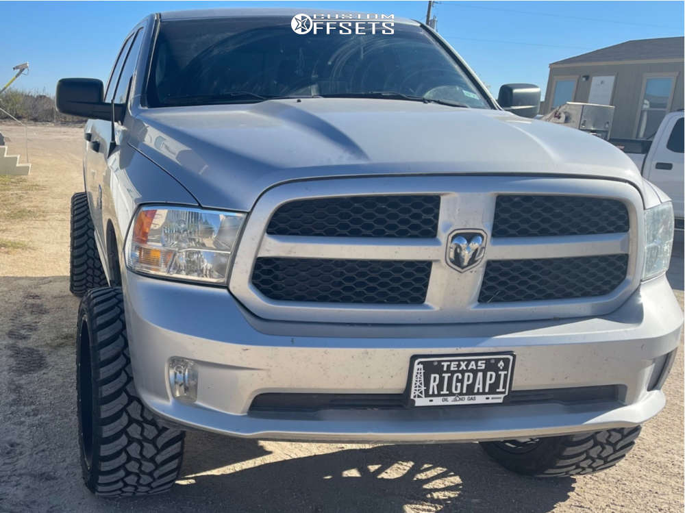 2018 Ram 1500 with 24x12 -51 Vision Rocker and 35/13.5R24 AMP Mud ...