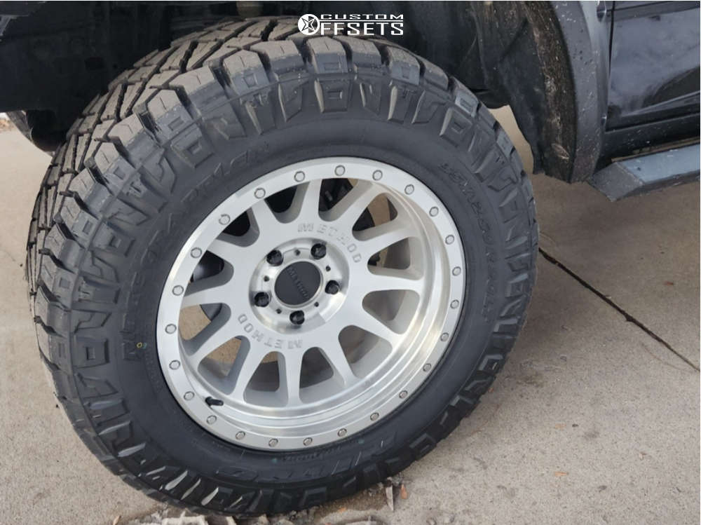 2014 Ram 1500 with 20x10 -24 Method Nv and 35/12.5R20 Nitto Ridge ...