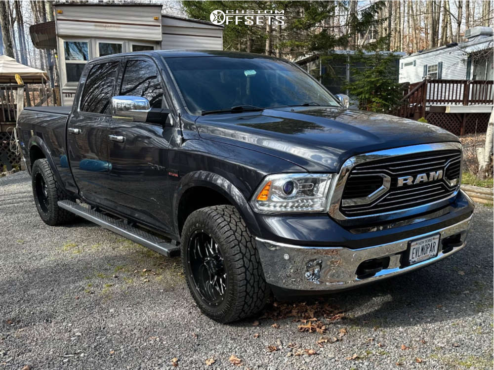 2016 Ram 1500 with 20x10 -18 Massiv Offroad Or1 and 33/12.5R20 Atturo ...
