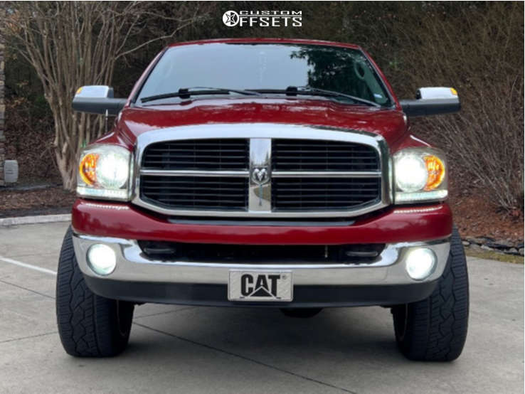 2007 Dodge Ram 2500 with 22x12 -44 Hostile Sprocket and 305/50R22 Nitto ...