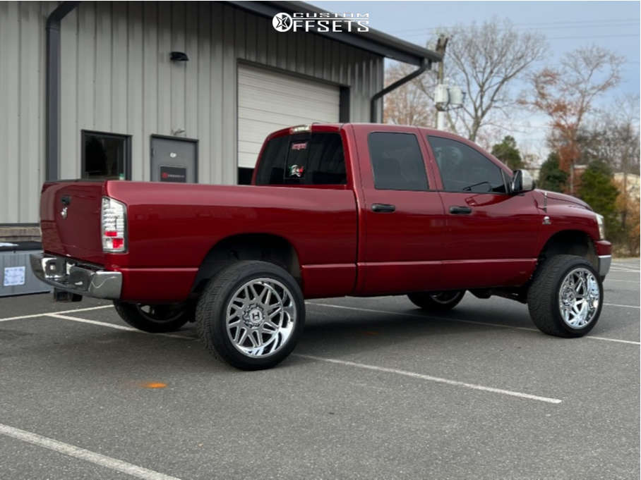 2007 Dodge Ram 2500 with 22x12 -44 Hostile Sprocket and 305/50R22 Nitto ...