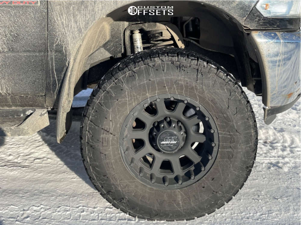2014 Ram 3500 with 17x9 -6 Pro Comp Series 32 and 35/12.5R17 Nitto ...