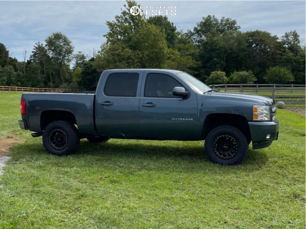 2012 Chevrolet Silverado 1500 with 17x8.5 0 Method MR305 and 33/12.5R17 ...