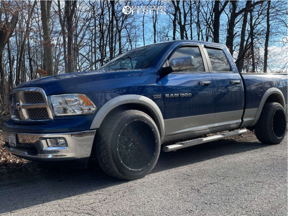 2011 Ram 1500 with 22x12 -51 Vision Rocker and 305/45R22 Versatyre ...