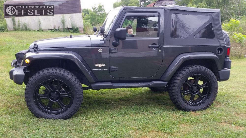 2010 Jeep Wrangler with 22x9.5 -12 Vision Raptor and 35/12.5R22 Black ...