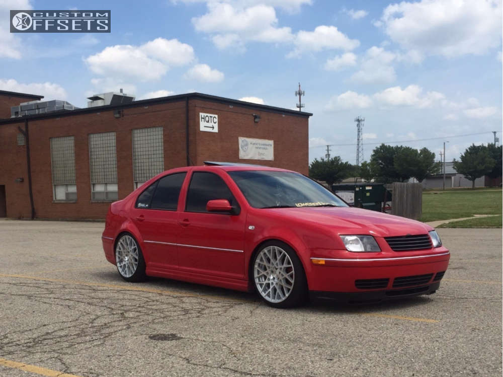2004 Volkswagen Jetta with 18x8.5 35 Rotiform Blq and 215/40R18 Delinte ...