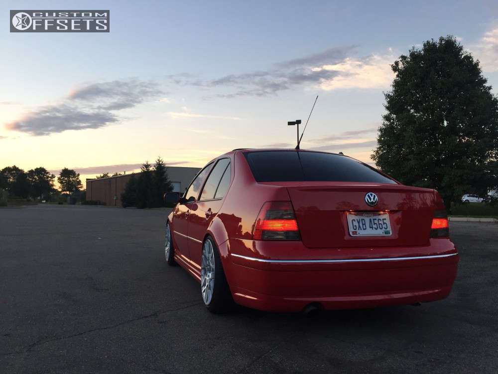 2004 Volkswagen Jetta with 18x8.5 35 Rotiform Blq and 215/40R18 Delinte ...