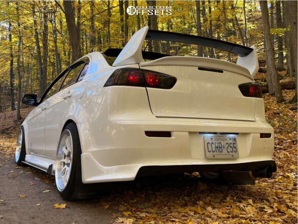 2014 Mitsubishi Lancer with 18x9.5 22 ESR Cs12 and 225/40R18 Nankang NS ...