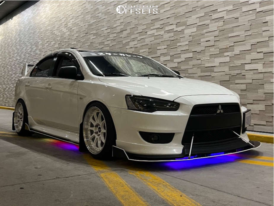 2014 Mitsubishi Lancer with 18x9.5 22 ESR Cs12 and 225/40R18 Nankang NS ...