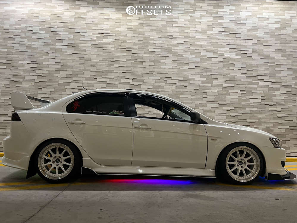 2014 Mitsubishi Lancer with 18x9.5 22 ESR Cs12 and 225/40R18 Nankang NS ...