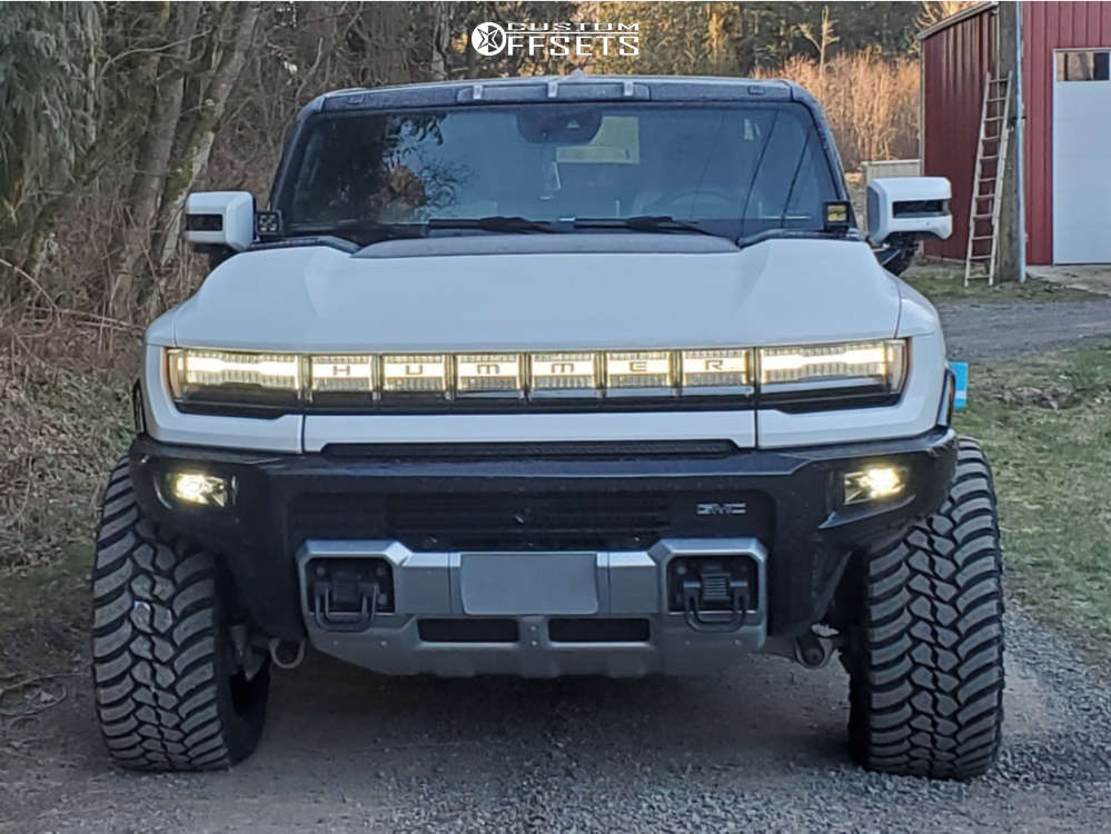 2022 GMC Hummer EV with 24x12 -44 Fuel Reaction and 37/13.5R24 AMP Mud ...