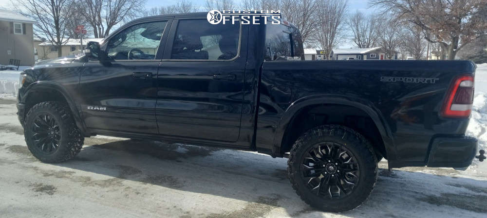 2022 Ram 1500 with 20x10 -18 Fuel Flame 6 and 33/12.5R20 Venom Power Terra Hunter Mt and ...