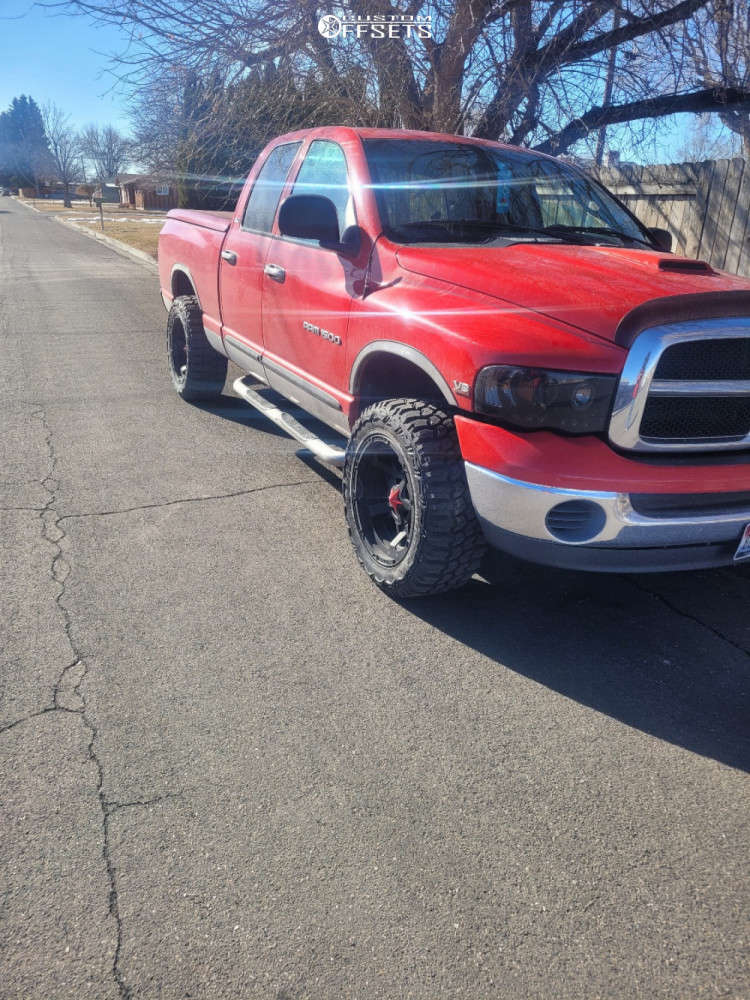 2002 Dodge Ram 1500 with 20x10 -24 XD Rockstar 3 and 33/12.5R20 ...