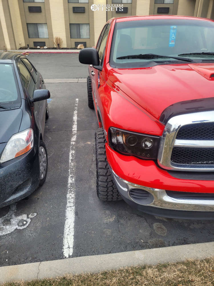 2002 Dodge Ram 1500 with 20x10 -24 XD Rockstar 3 and 33/12.5R20 ...