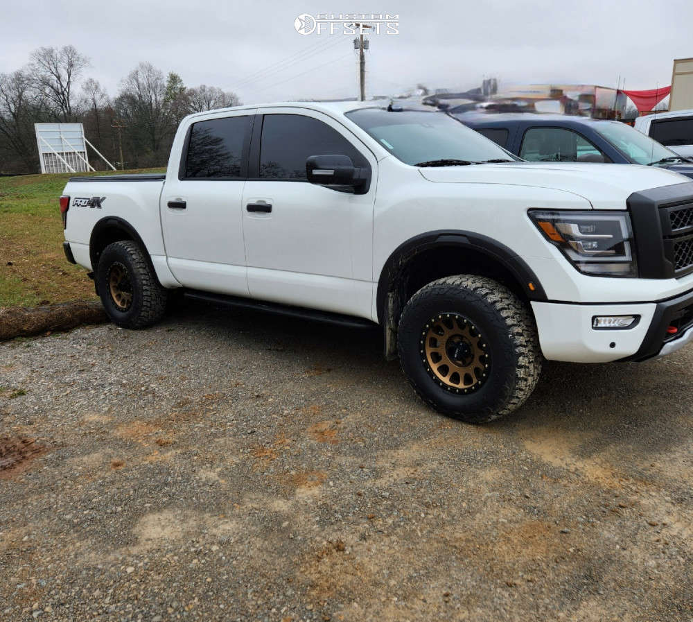 2022 Nissan Titan with 17x8.5 0 Method MR305 and 285/70R17 Mickey ...