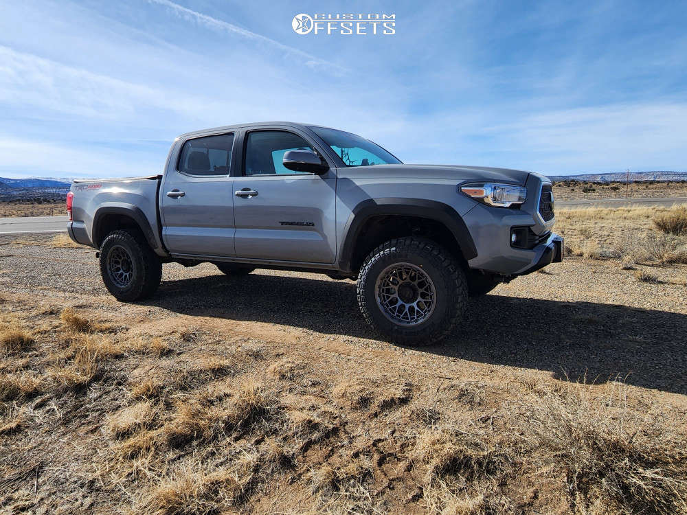 2019 Toyota Tacoma with 17x8.5 0 KMC Km722 and 265/70R17 Kenda Klever R ...