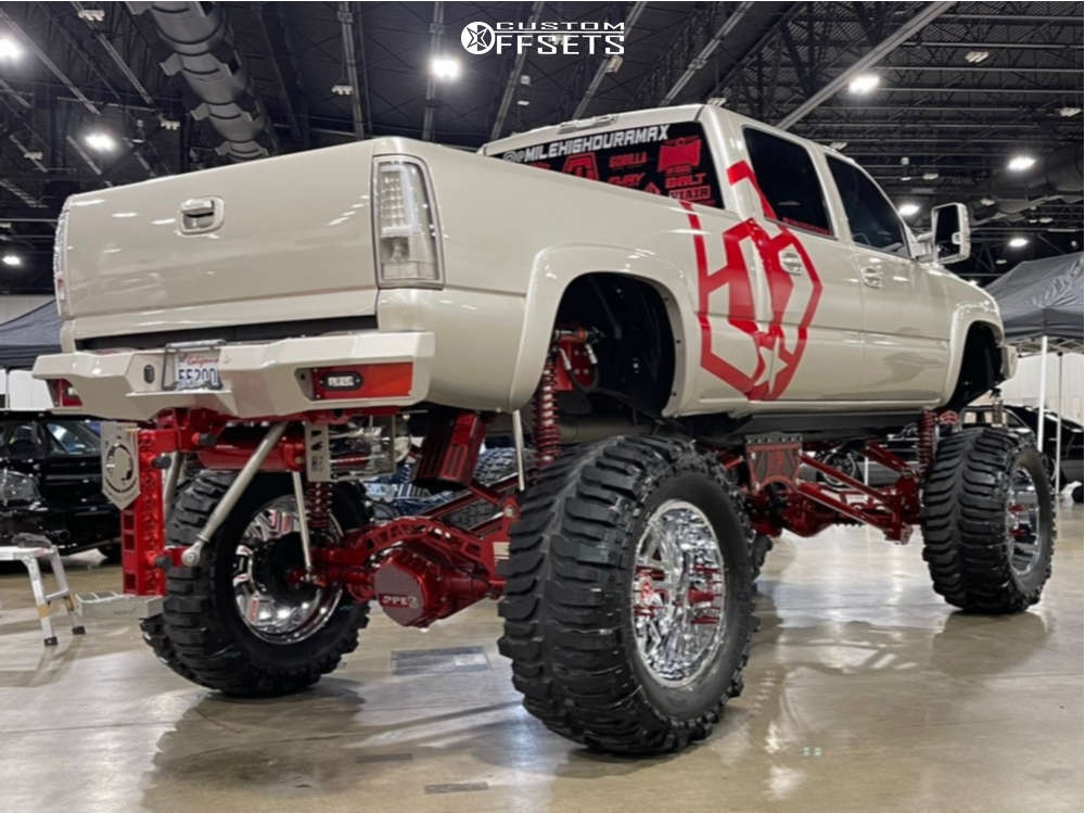 2006 GMC Sierra 3500 with 24x14 -76 TIS 547c and 44/19.5R24 Interco ...