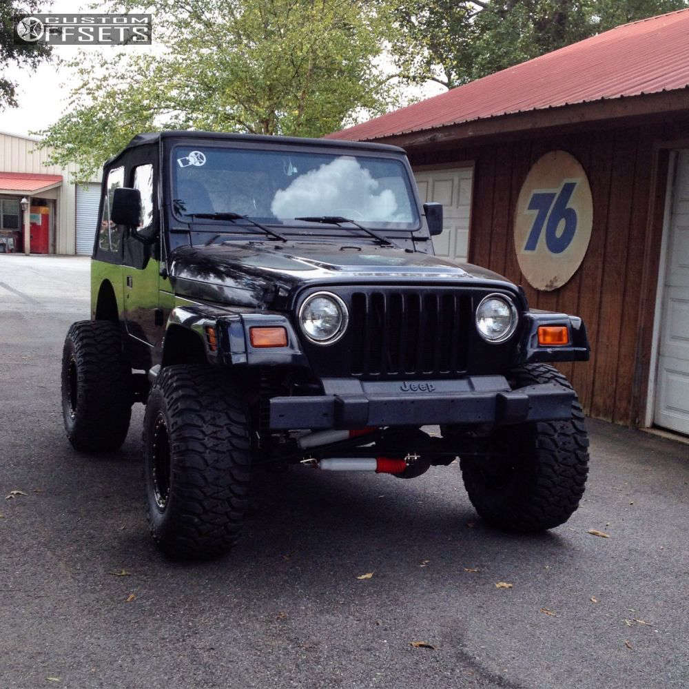 1999 Jeep Wrangler with 15x10 -44 Pro Comp Series 252 and 33/12.5R15 ...