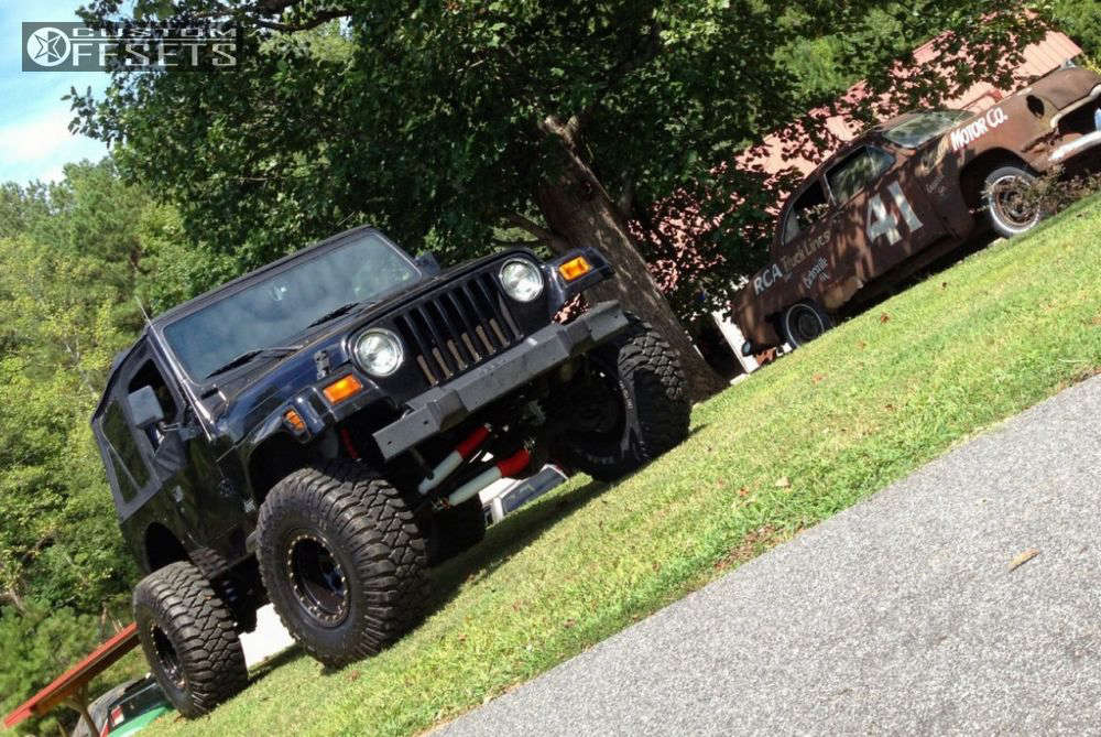 1999 Jeep Wrangler with 15x10 -44 Pro Comp Series 252 and 33/12.5R15 ...