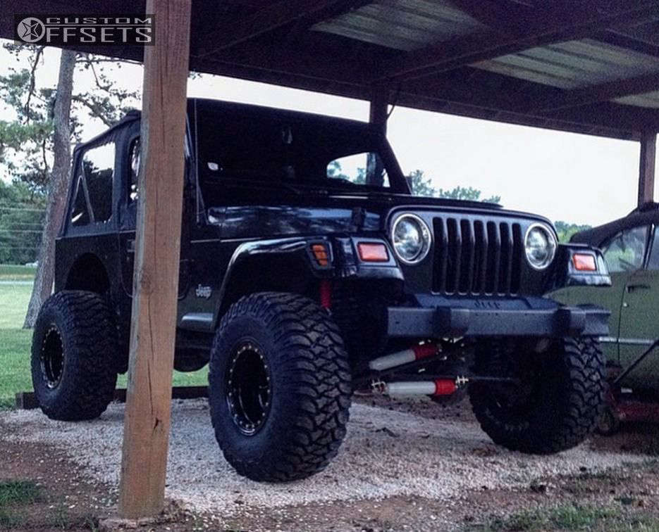 1999 Jeep Wrangler with 15x10 -44 Pro Comp Series 252 and 33/12.5R15 ...