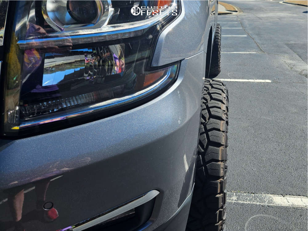 2019 Chevrolet Suburban with 20x10 -25 Vision Razor and 35/12.5R20 ...